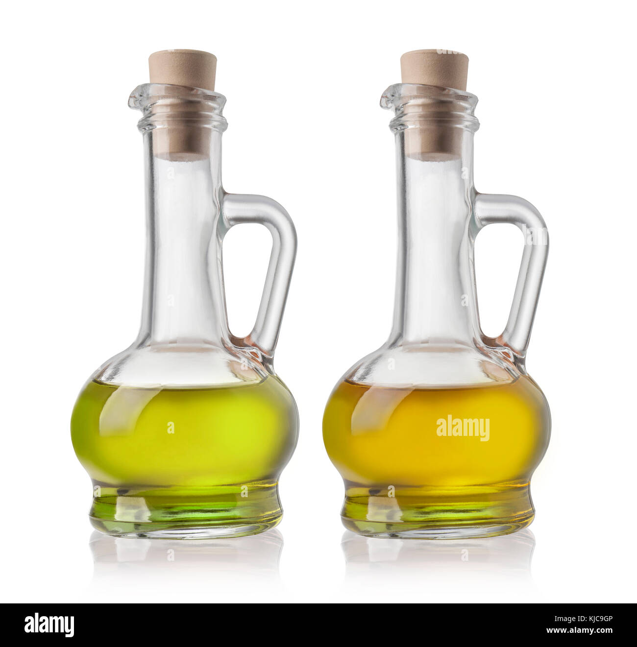 olive vegetable oil in glass pitcher isolated on white Stock Photo - Alamy