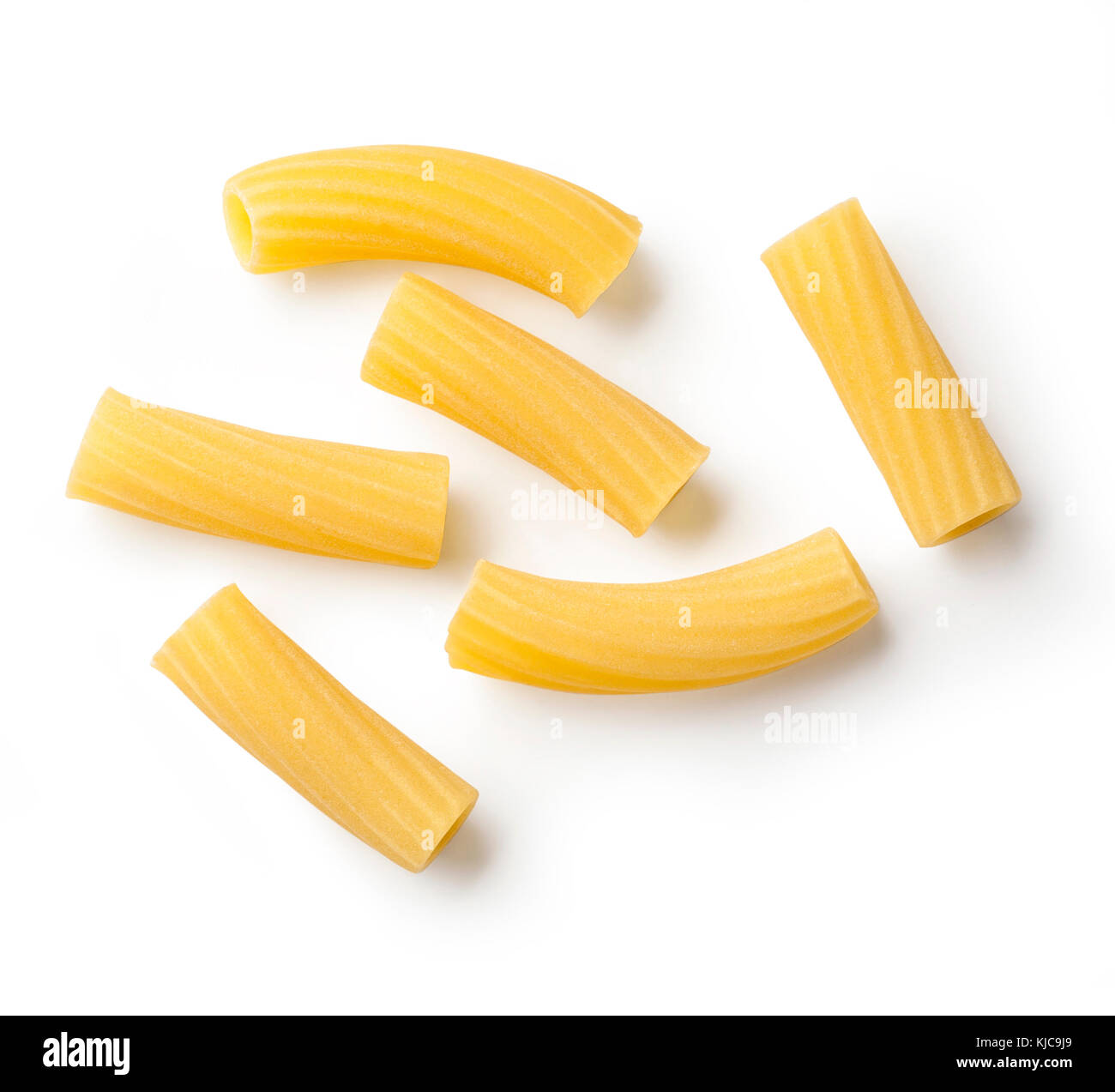 tortiglioni raw pasta isolated on white background with clipping path ...