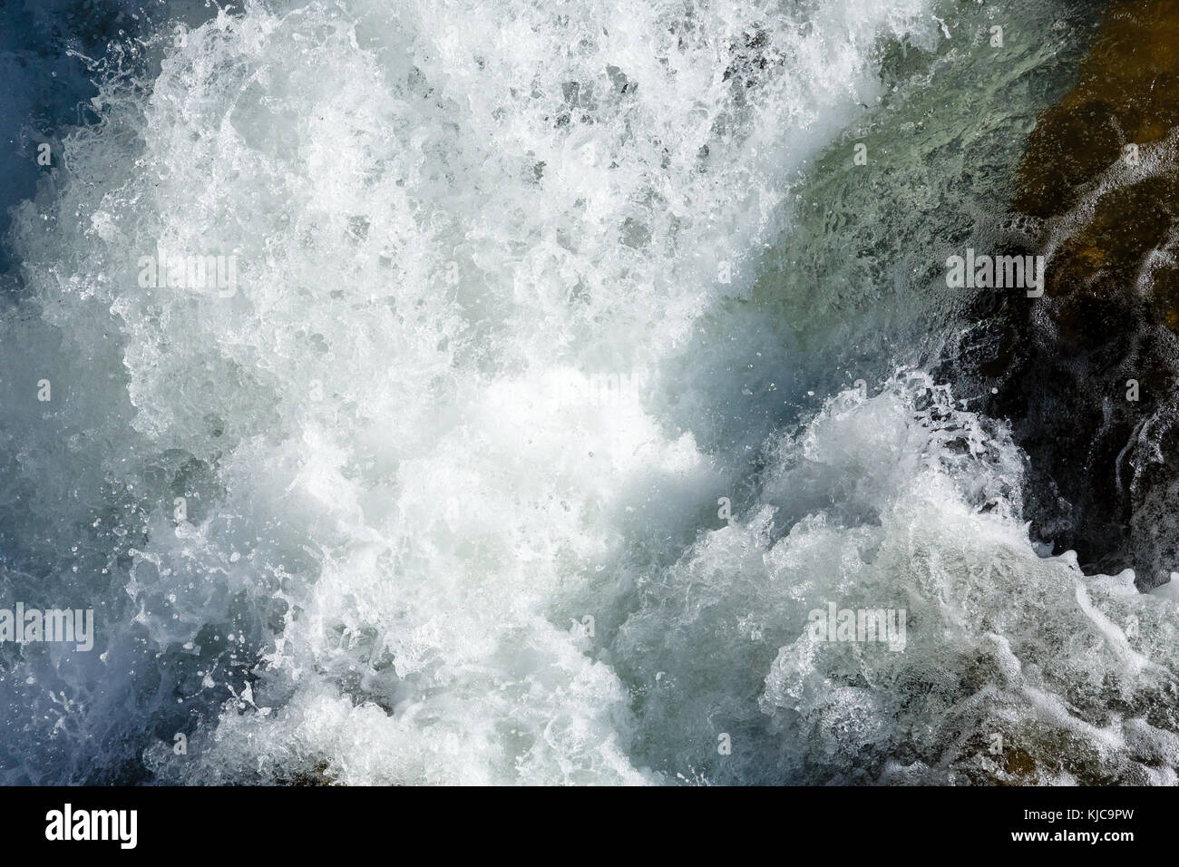 Rapid water of waterfall close-up (nature background Stock Photo - Alamy