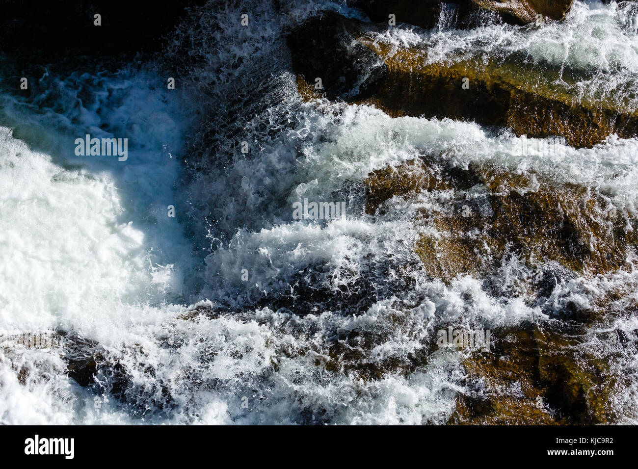 Rapid water of waterfall close-up (nature background Stock Photo - Alamy