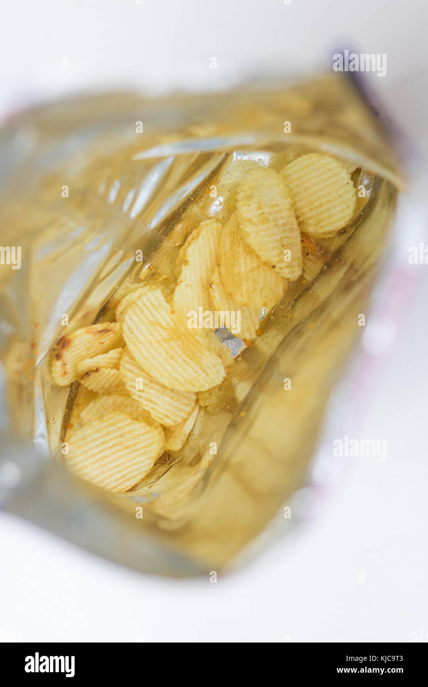 Potato chips Almost completely empty bag Stock Photo - Alamy