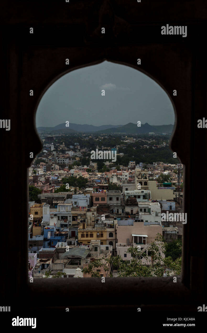 A view of Udaipur through a temple window Stock Photo - Alamy