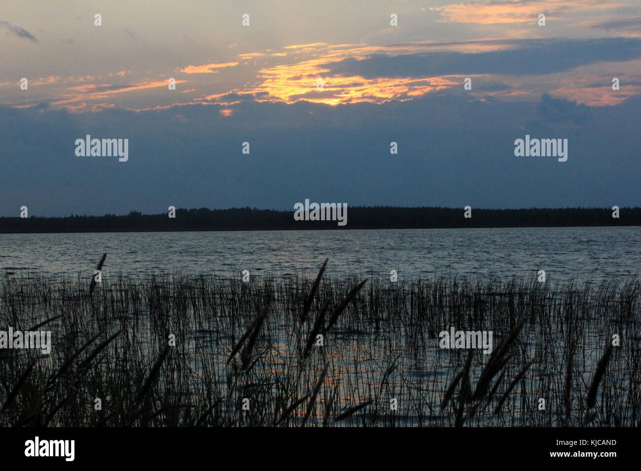 This image showcases a sunset view behind clouds at Minnesota's ...