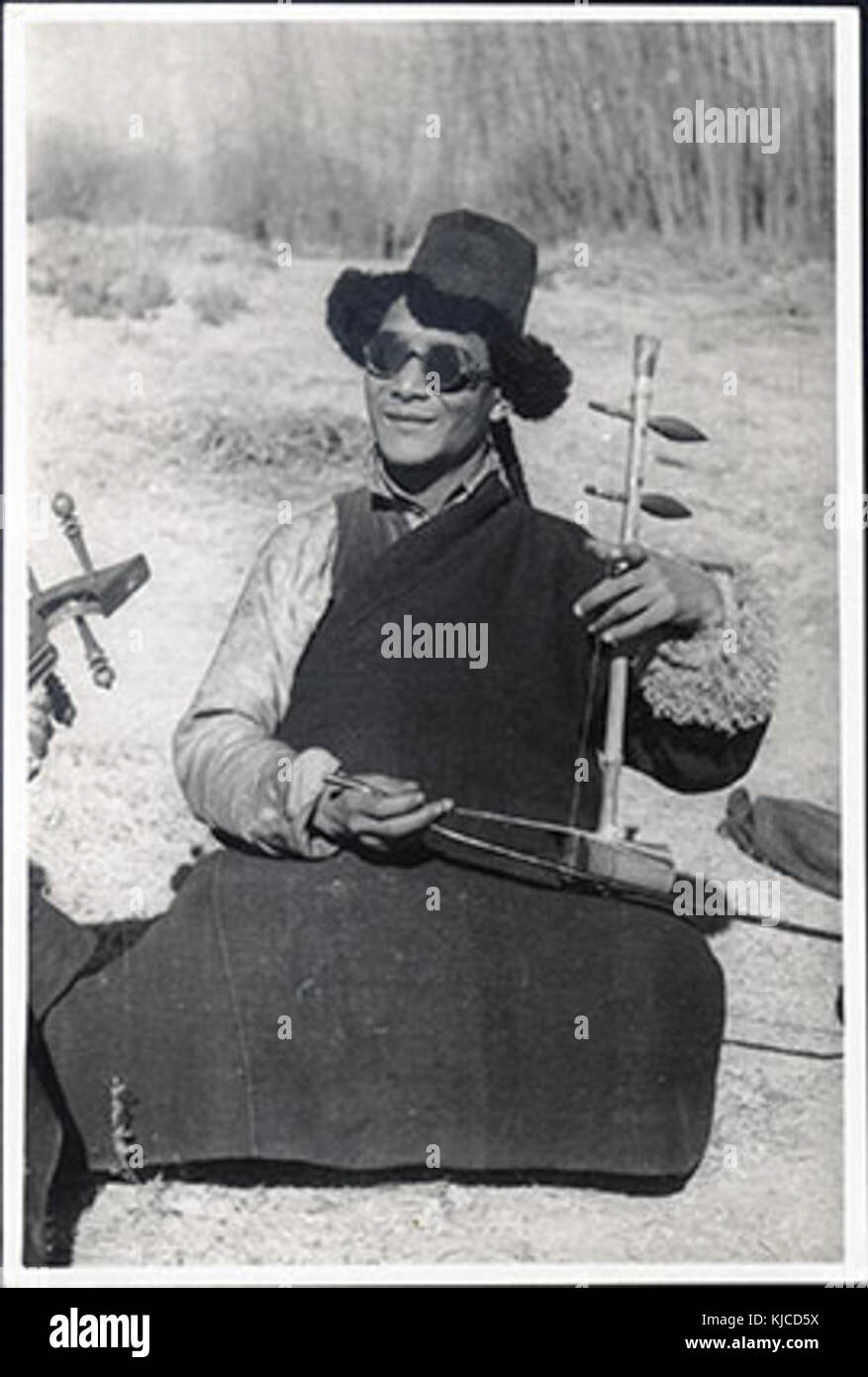 Blind musician in Lhasa Band Stock Photo - Alamy