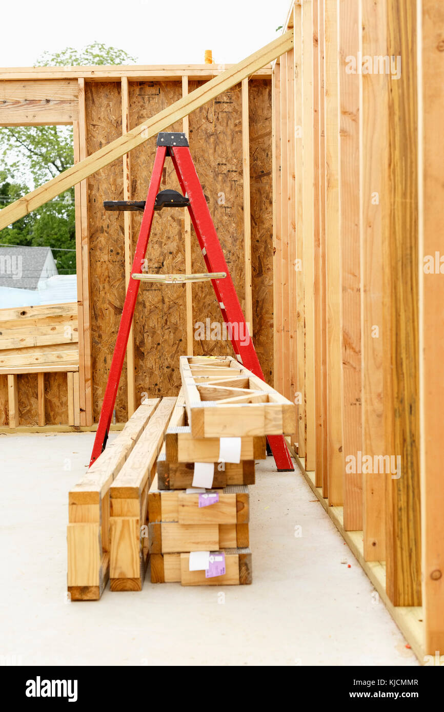 Ladder and wooden frame at construction site Stock Photo - Alamy