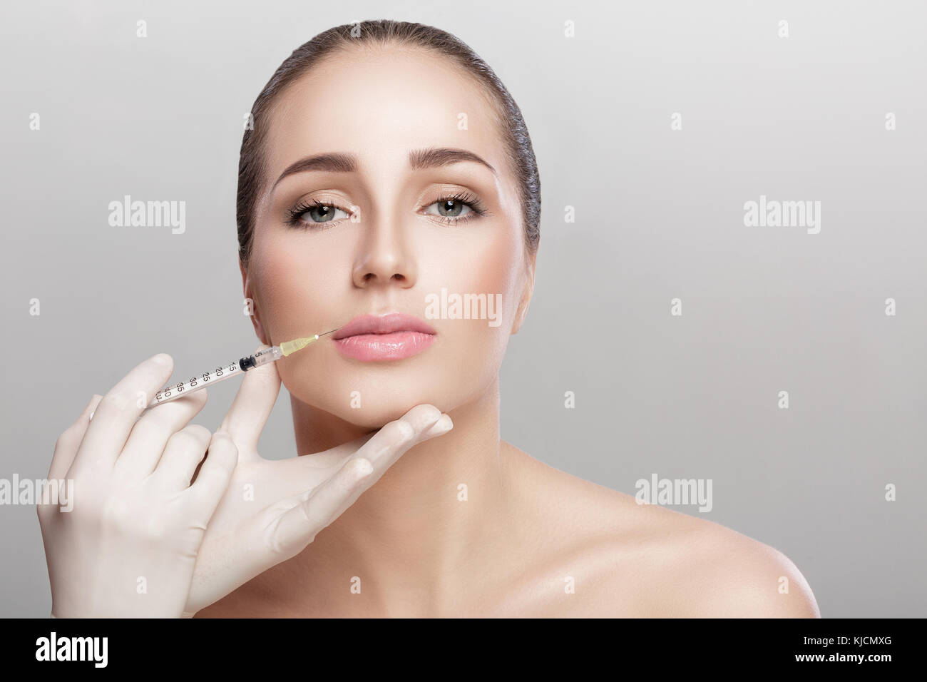 beautiful woman getting injection Stock Photo - Alamy