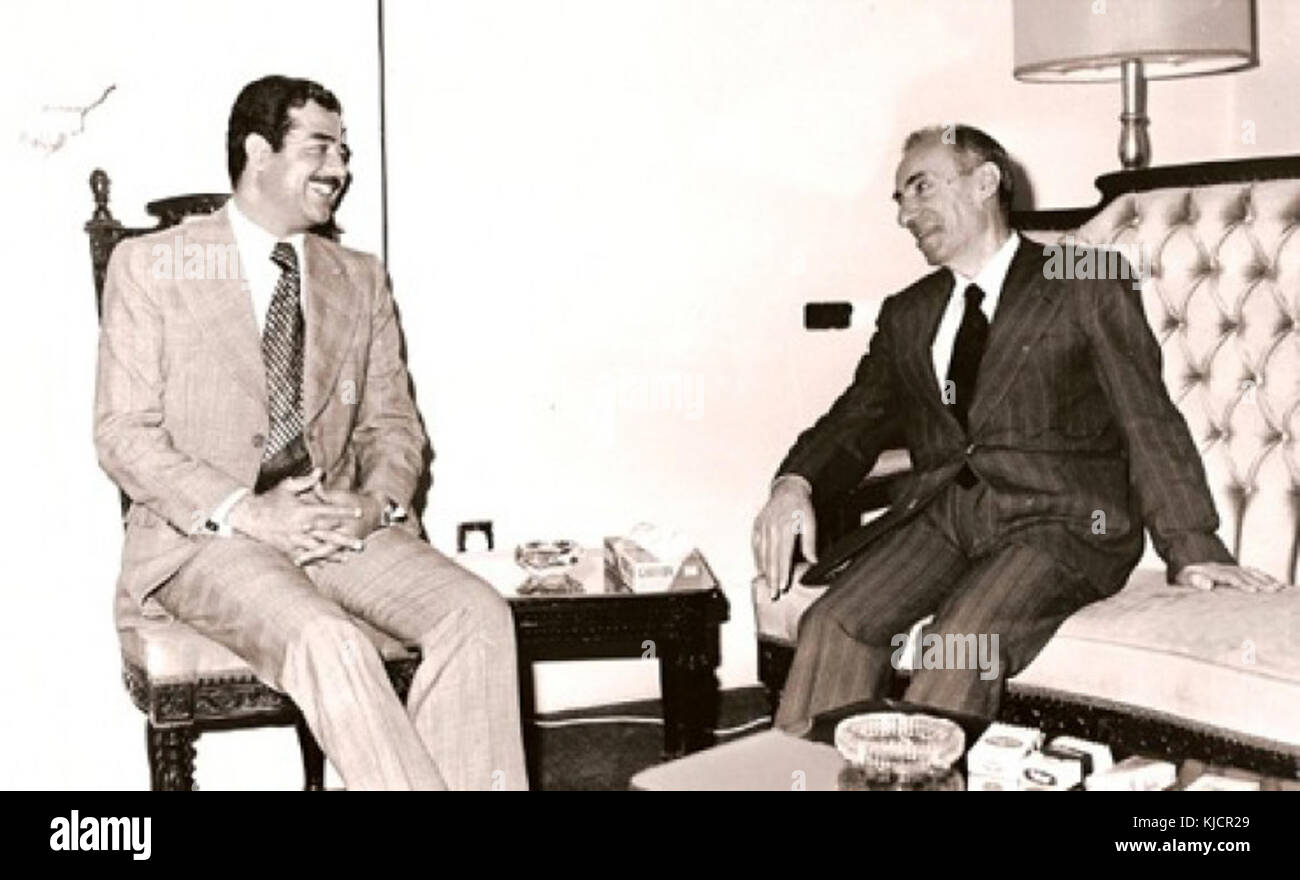 Iraqi President Saddam Hussein with Baath Party founder Michel Aflaq in ...