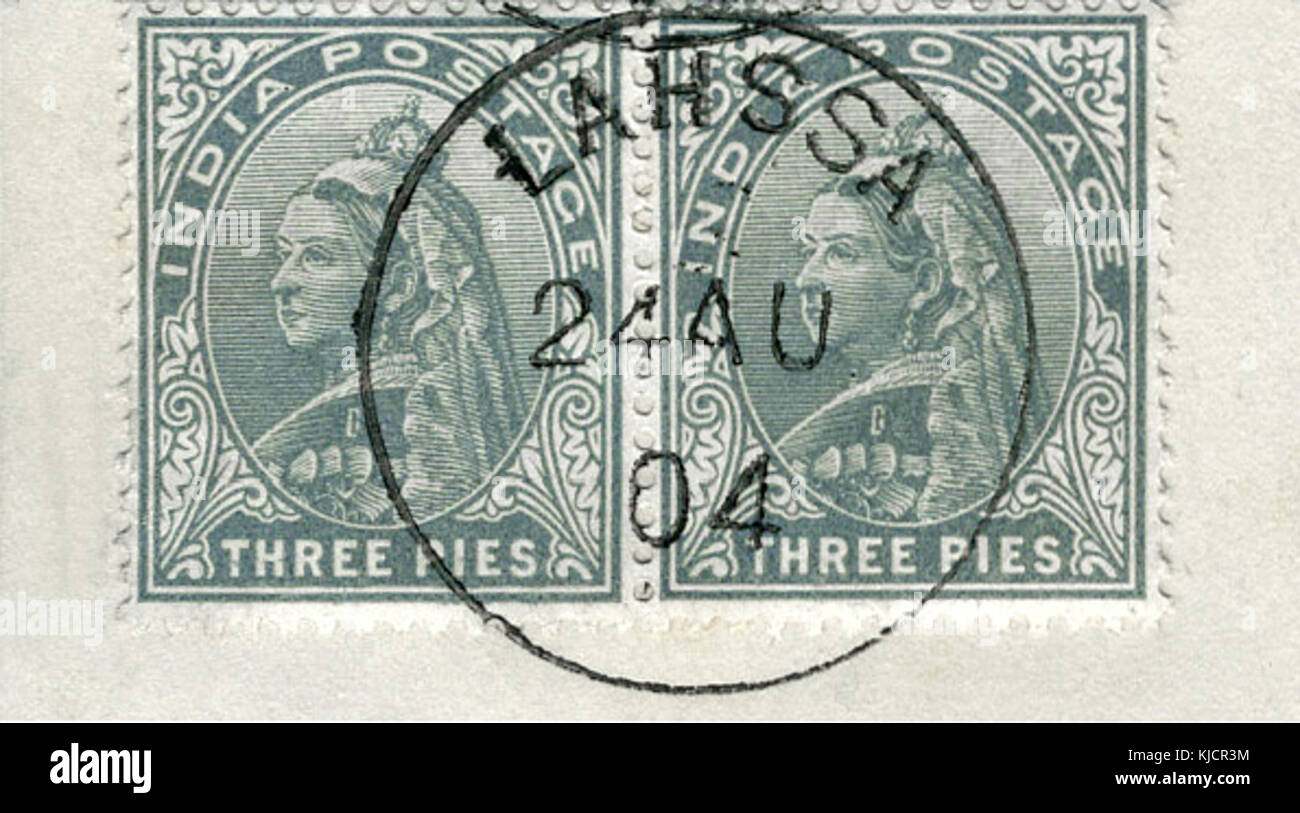 A photograph of a grey statue of Queen Victoria from India, likely ...