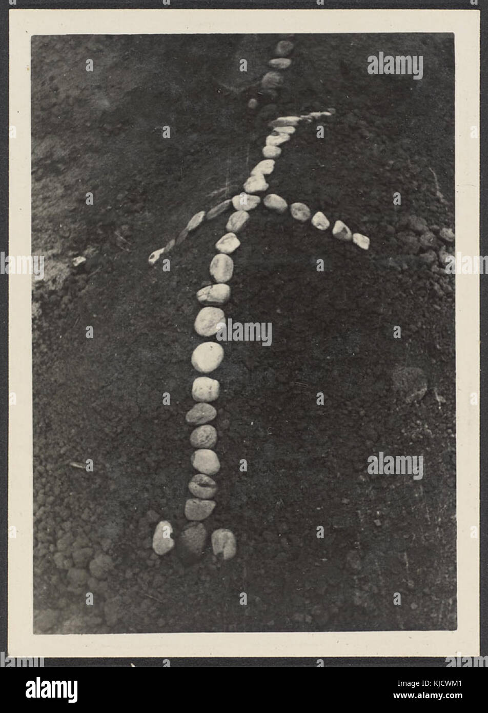 A photograph or historical record showing a grave site of the Salar ...