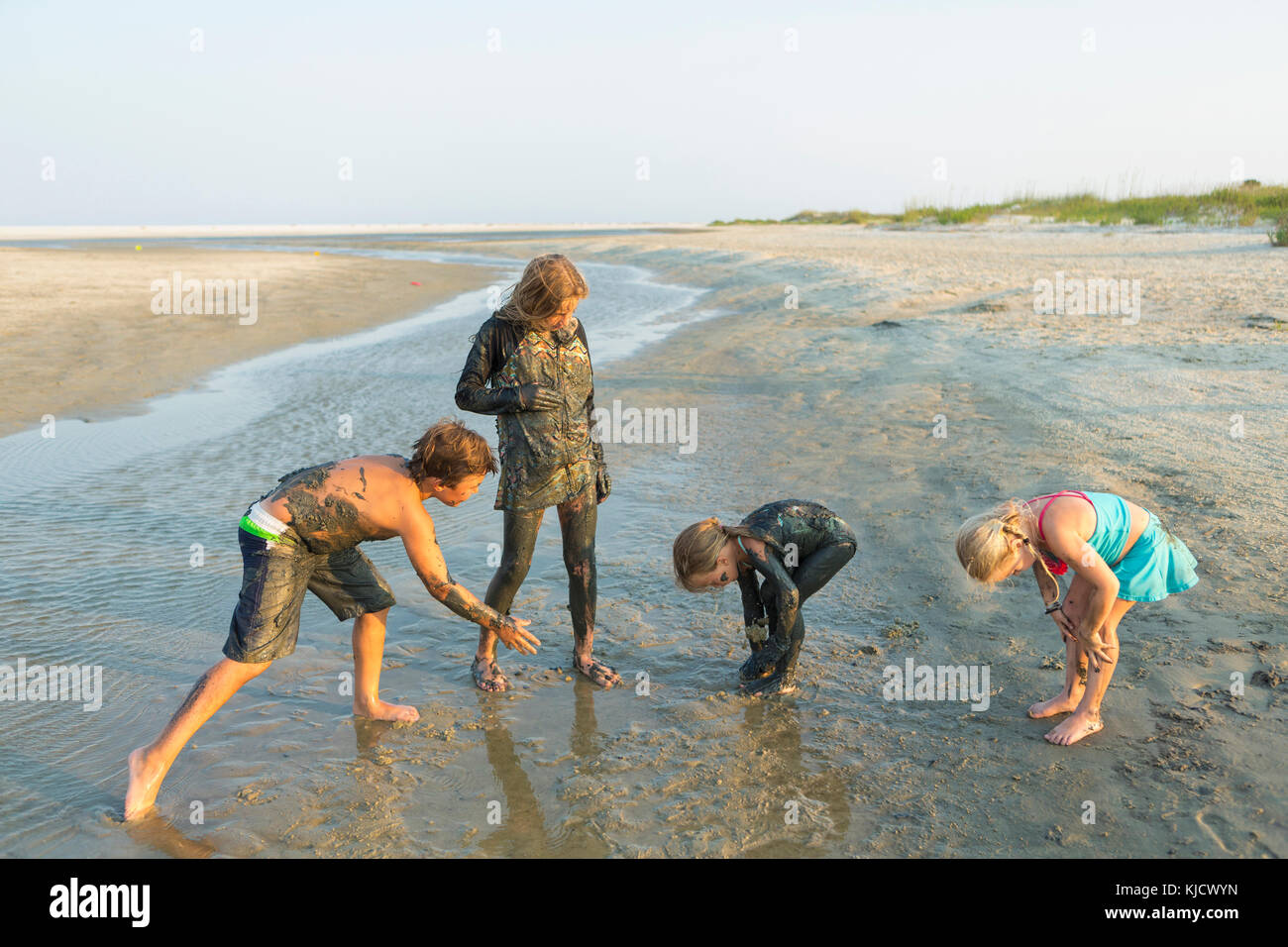 People playing covered in mud hi-res stock photography and images - Alamy