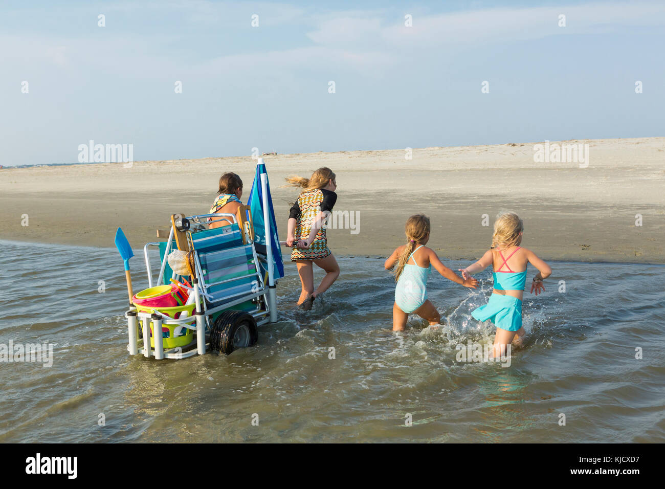 Boy pulling wagon hi-res stock photography and images - Alamy