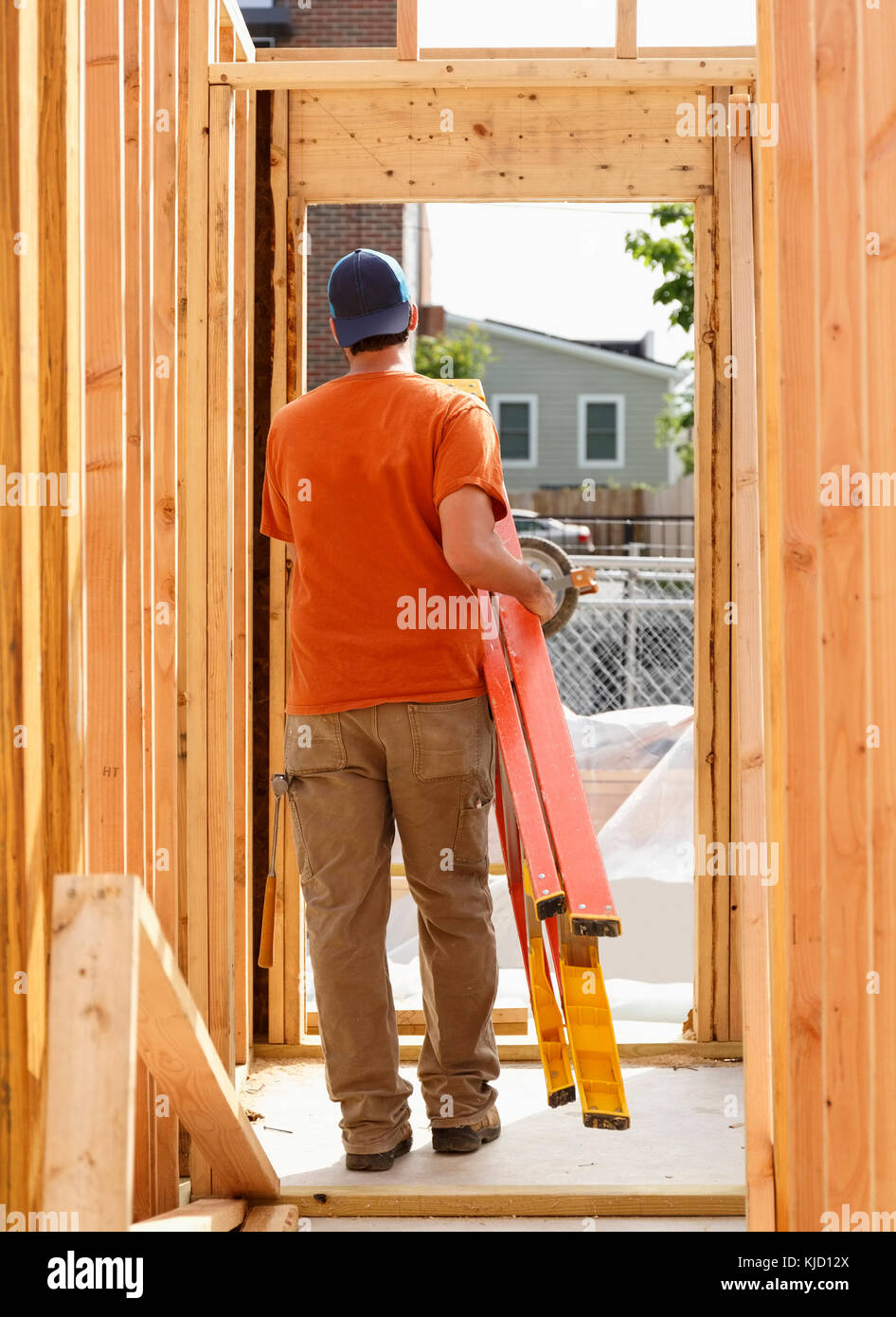 Carrying a wooden ladder hi-res stock photography and images - Alamy