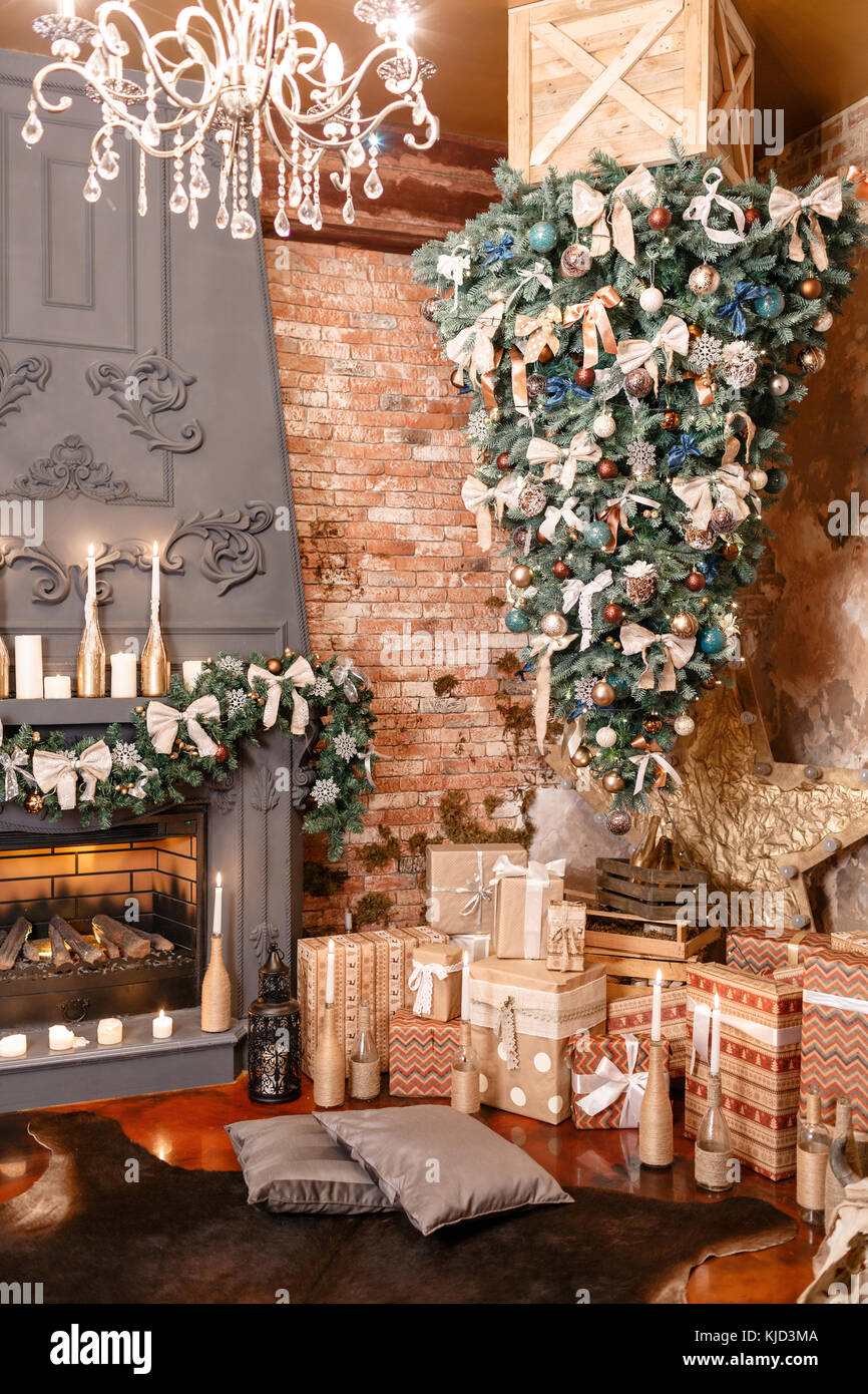 Many Christmas gifts. Winter home decor. Modern loft interior Stock ...