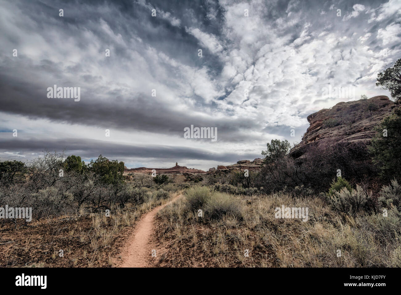 "Clouds over path in desert, Moab, Utah, United States Stock Photo - Alamy