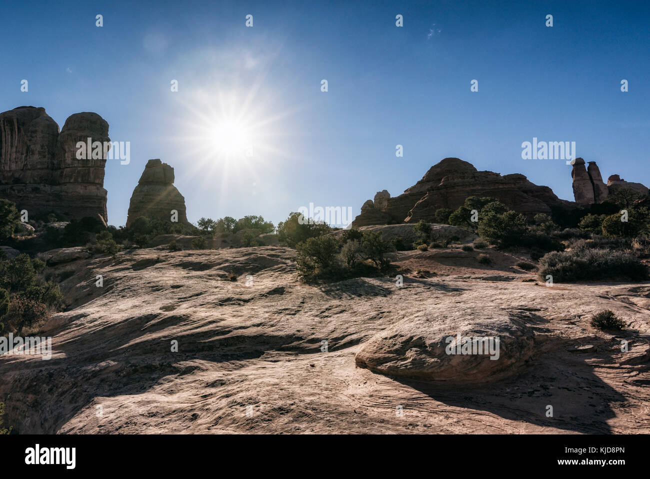 "Sun in blue sky over desert, Moab, Utah, United States Stock Photo - Alamy