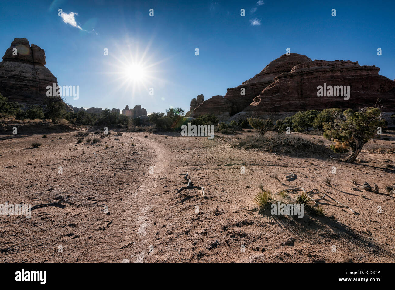 "Sun in blue sky over desert, Moab, Utah, United States Stock Photo - Alamy
