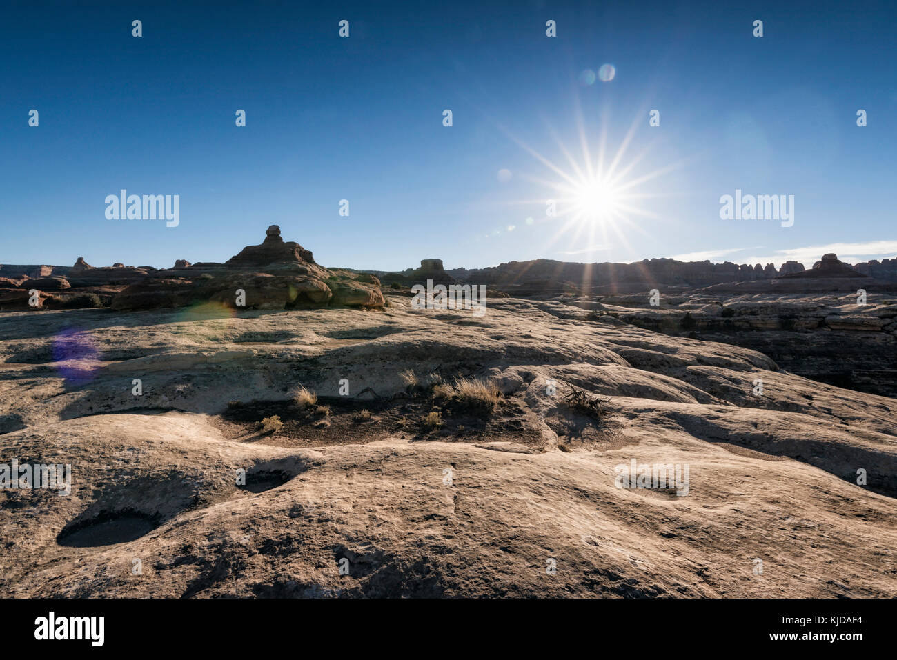 "Sun in blue sky over desert, Moab, Utah, United States Stock Photo - Alamy