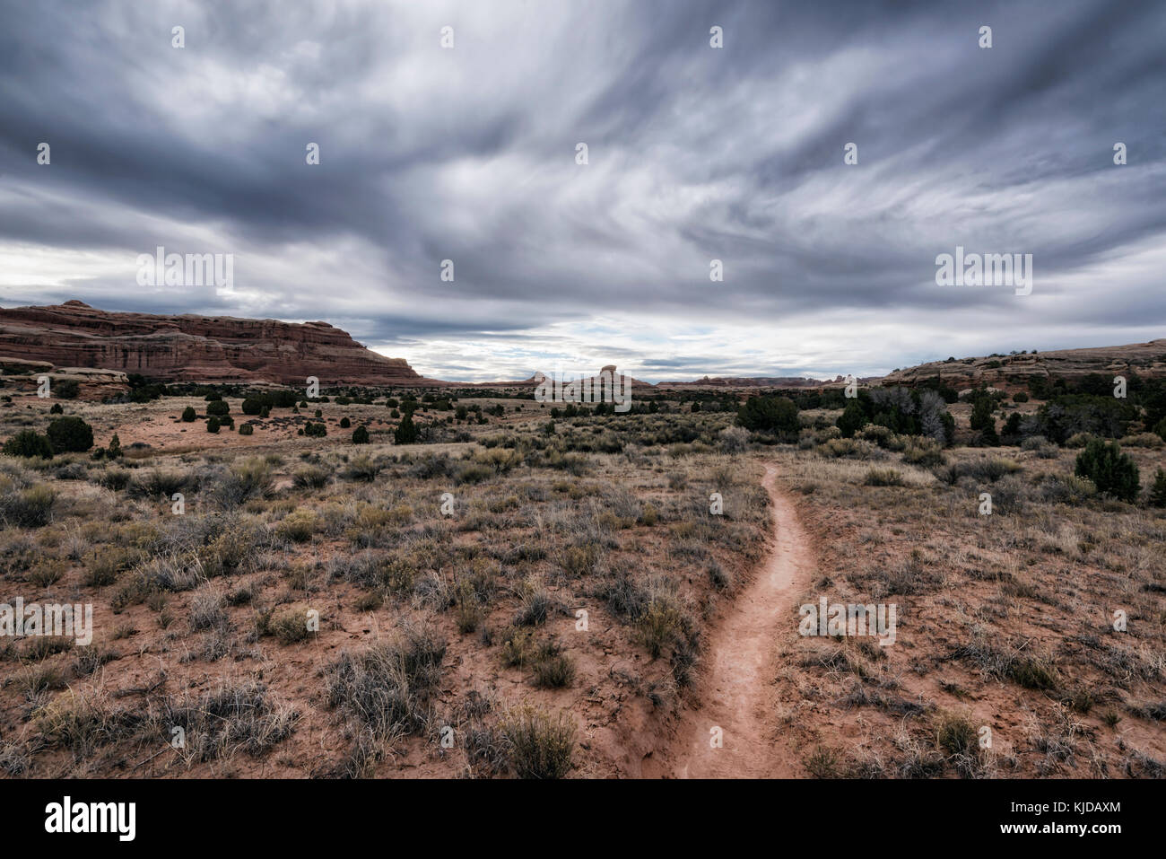 "Clouds over desert path, Moab, Utah, United States Stock Photo - Alamy