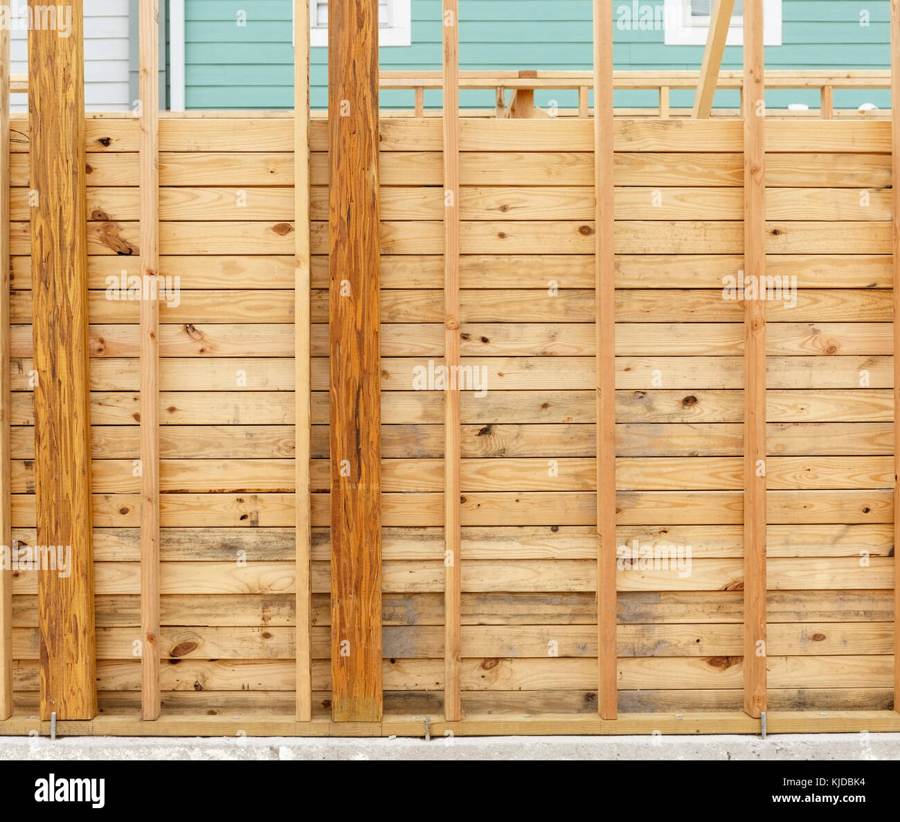 Wooden wall at construction site Stock Photo - Alamy