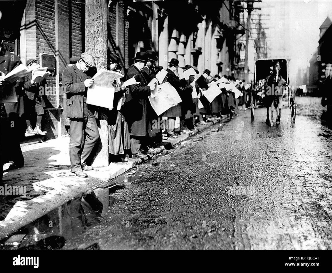 Men reading the want advertisments for jobs, Melinda Street Stock Photo ...