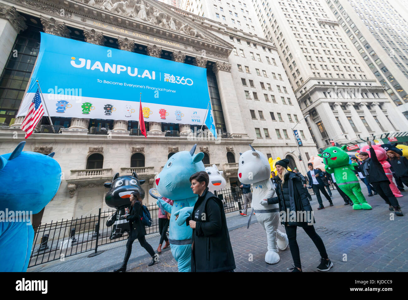 Actors dressed as mascots (with their handlers) parade and pose for ...