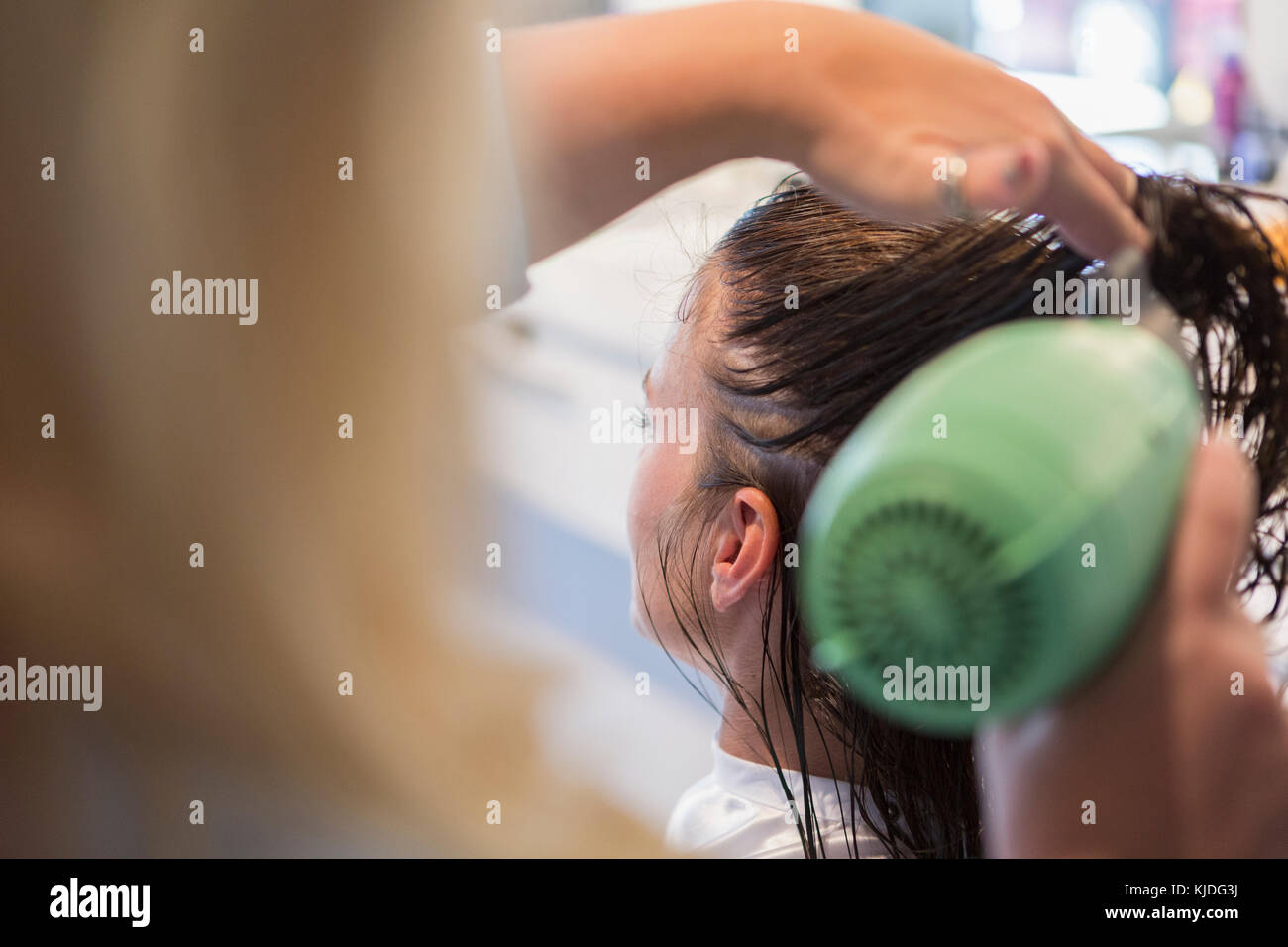 Asian woman drying hair hi-res stock photography and images - Alamy