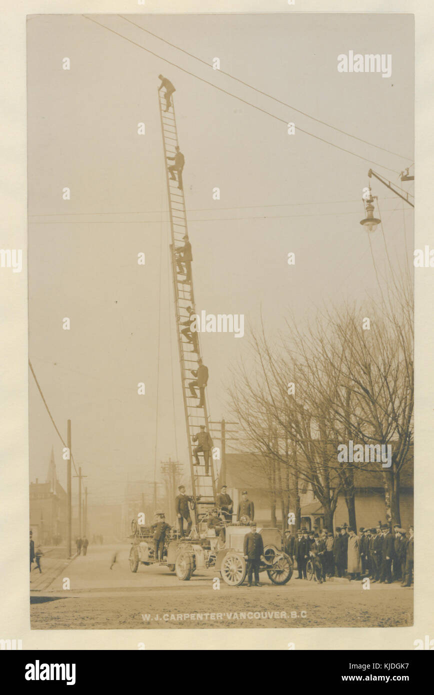 This image depicts a fire department aerial ladder truck in Vancouver ...