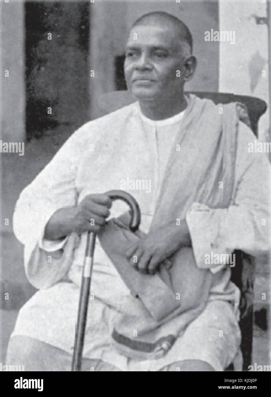 Swami Saradananda seated Stock Photo - Alamy