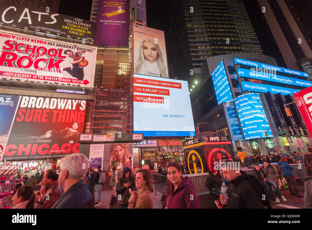 Electronic billboards in Times Square in New York show "Impeach Trump ...