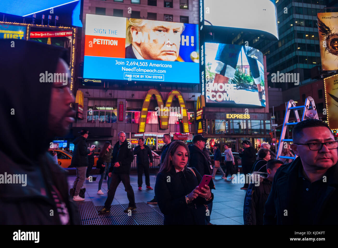 Electronic billboards in Times Square in New York show "Impeach Trump ...