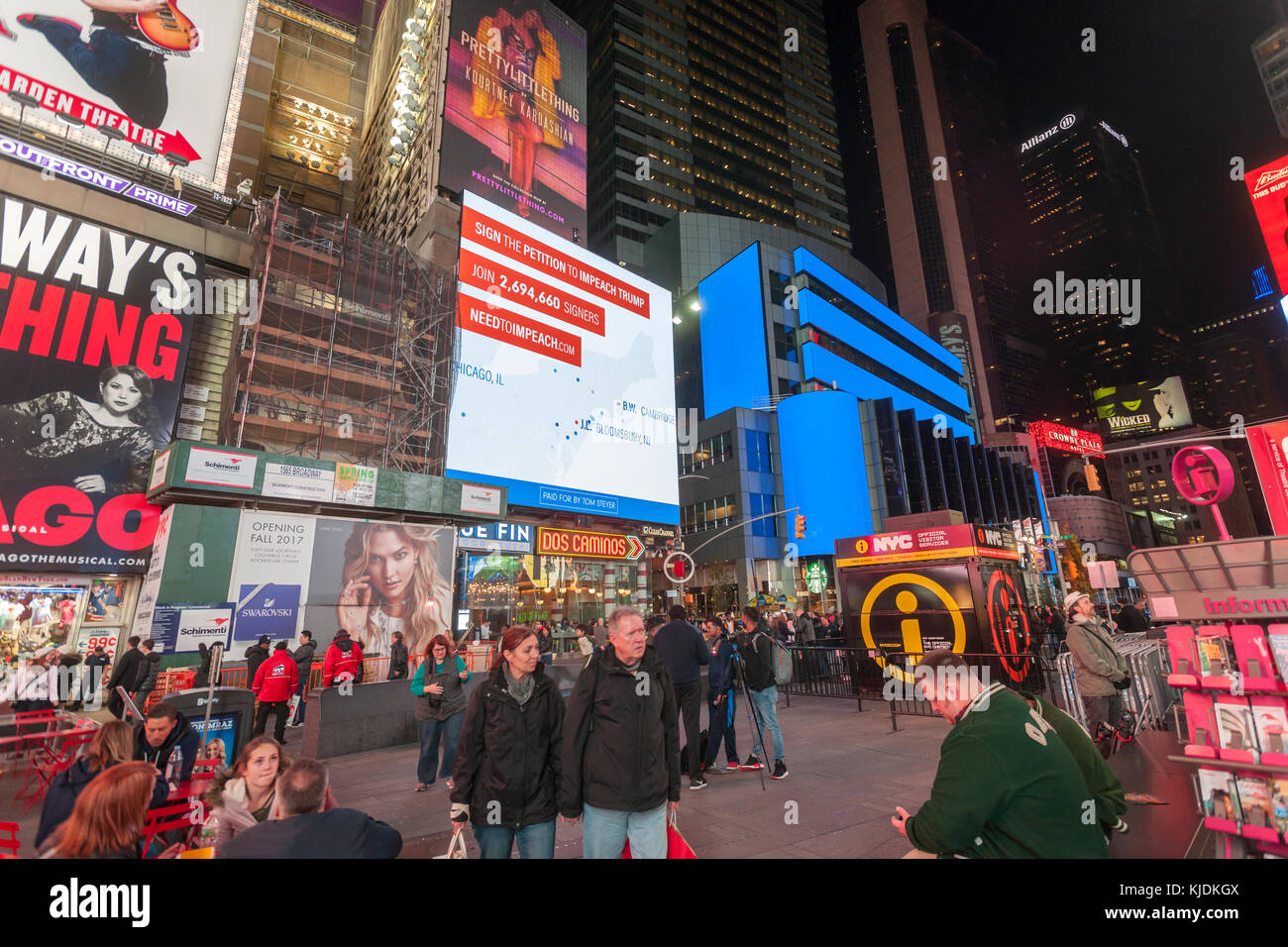 Electronic billboards in Times Square in New York show "Impeach Trump ...