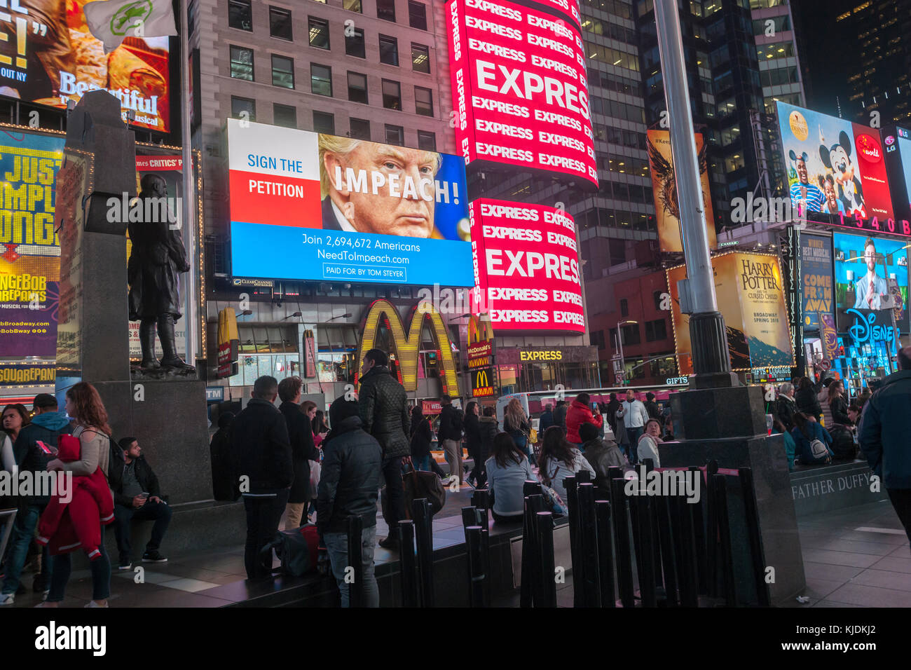 Electronic billboards in Times Square in New York show "Impeach Trump ...