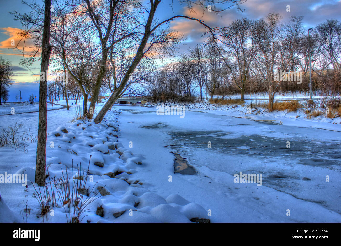This image captures the icy river near Madison, Wisconsin, known for ...