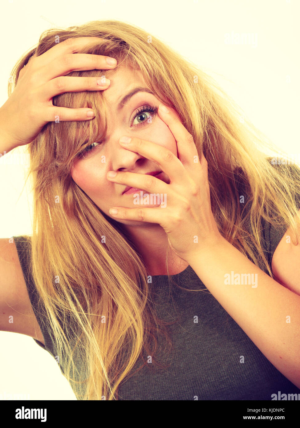 Emotions, embarrassment, awkwardness gestures concept. Ashamed blonde ...