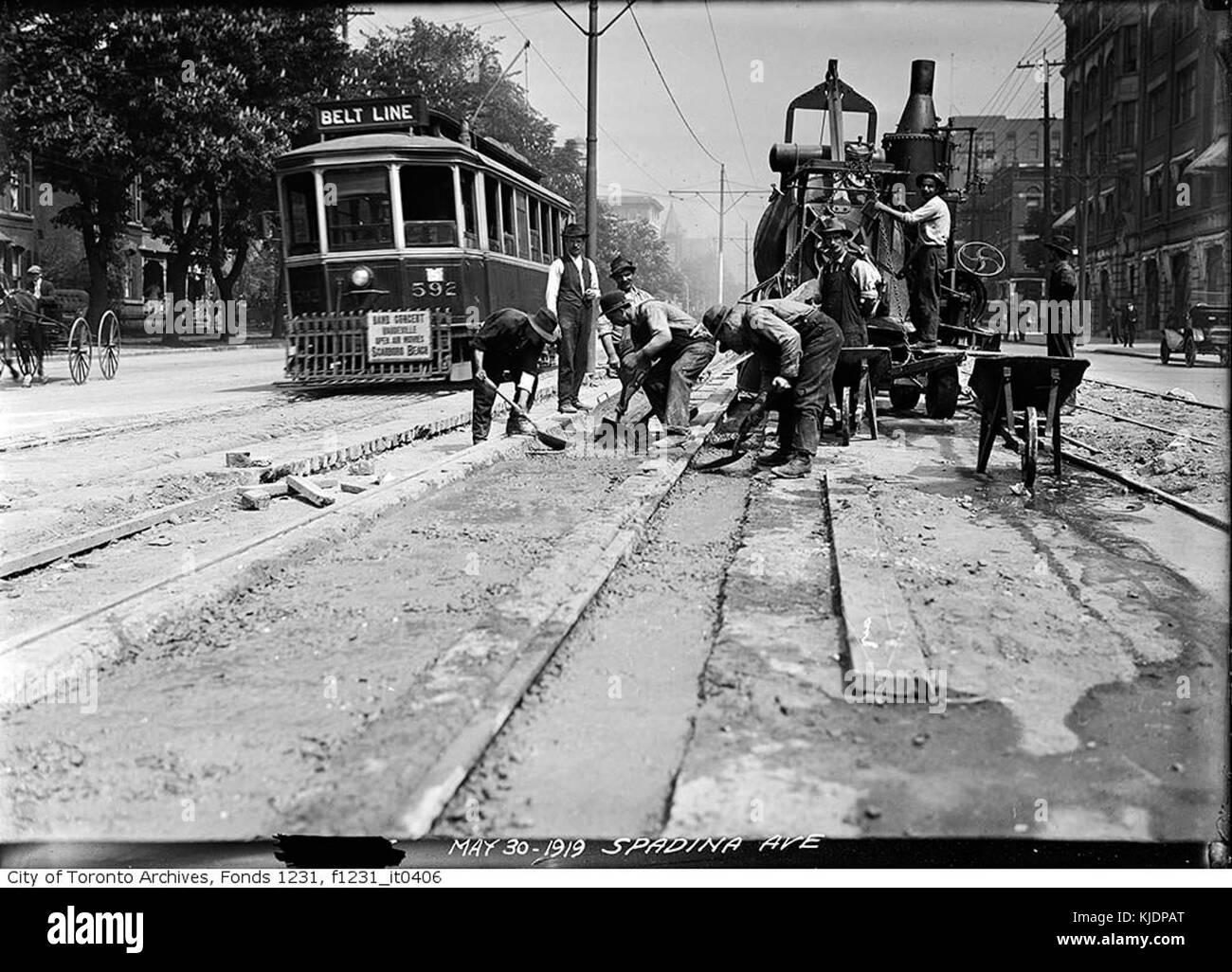 Peter Witt streetcar, on the old belt line route, passing roadwork on ...