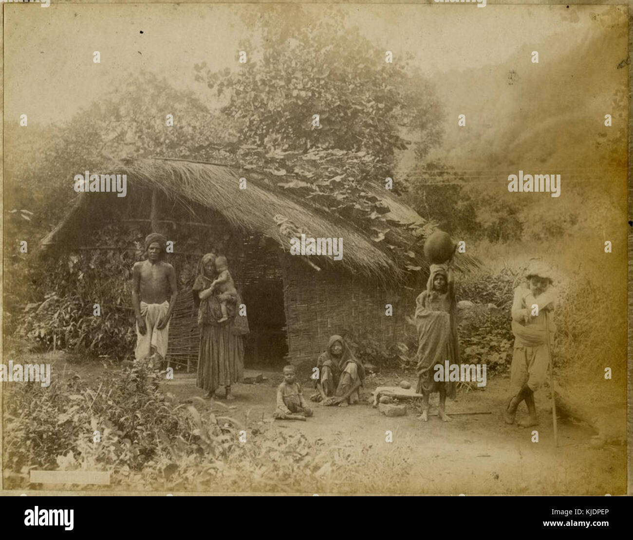 A poor family outside their hut an albumen photo, c.1880's Stock Photo ...