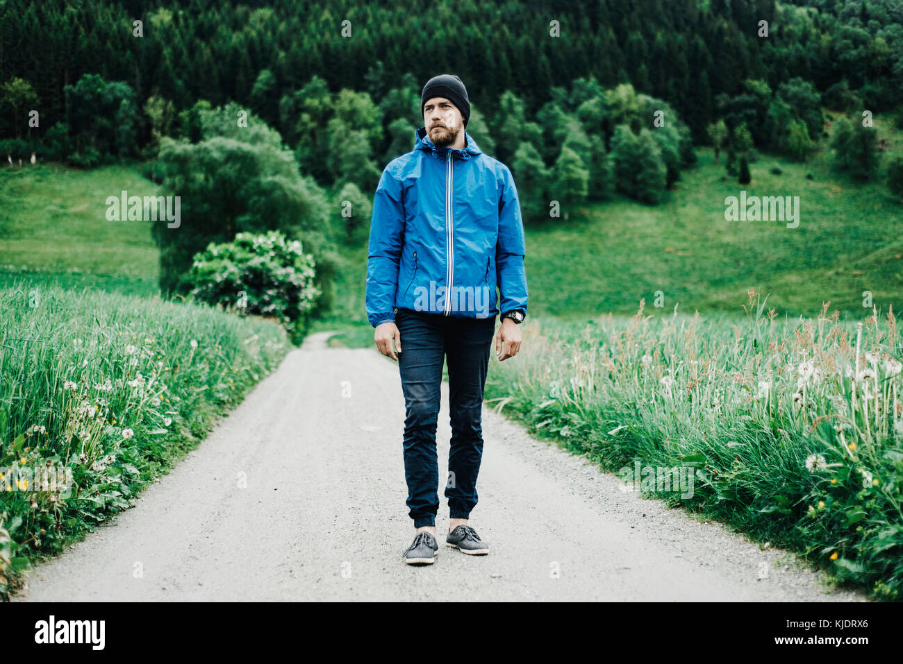 Person standing on roadway hi-res stock photography and images - Alamy