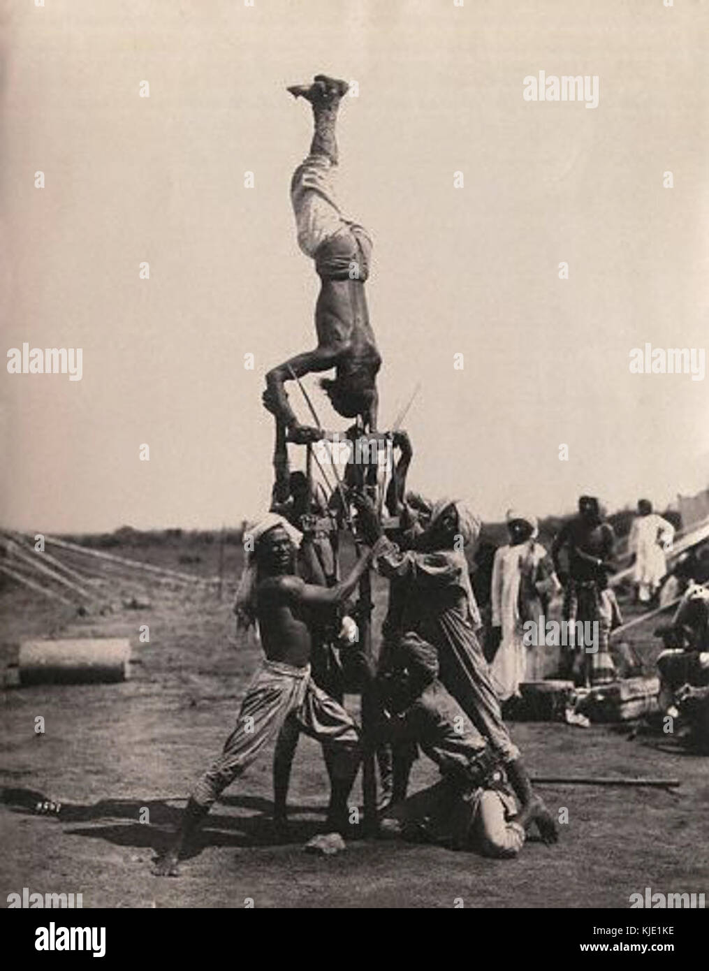 Indian villagers performing a sword trick Stock Photo - Alamy