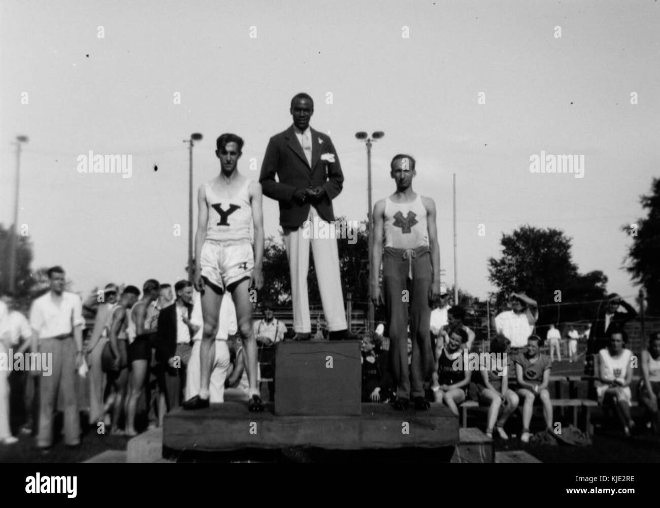 Phil Edwards, top winner of the 800 meters race, is celebrated here ...