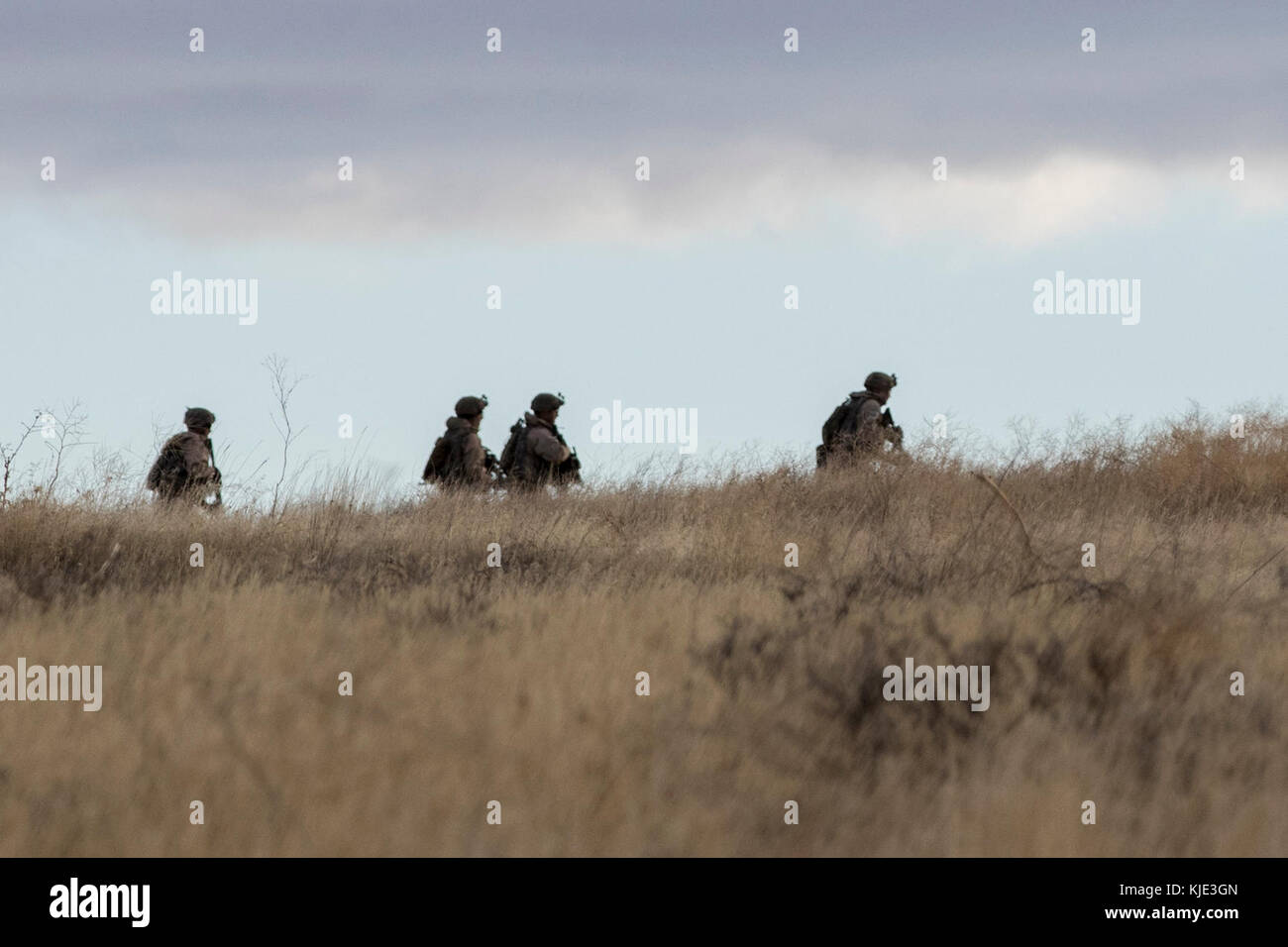 Soldiers with 1-23 Infantry, 1-2 Stryker Brigade Combat Team, approach ...
