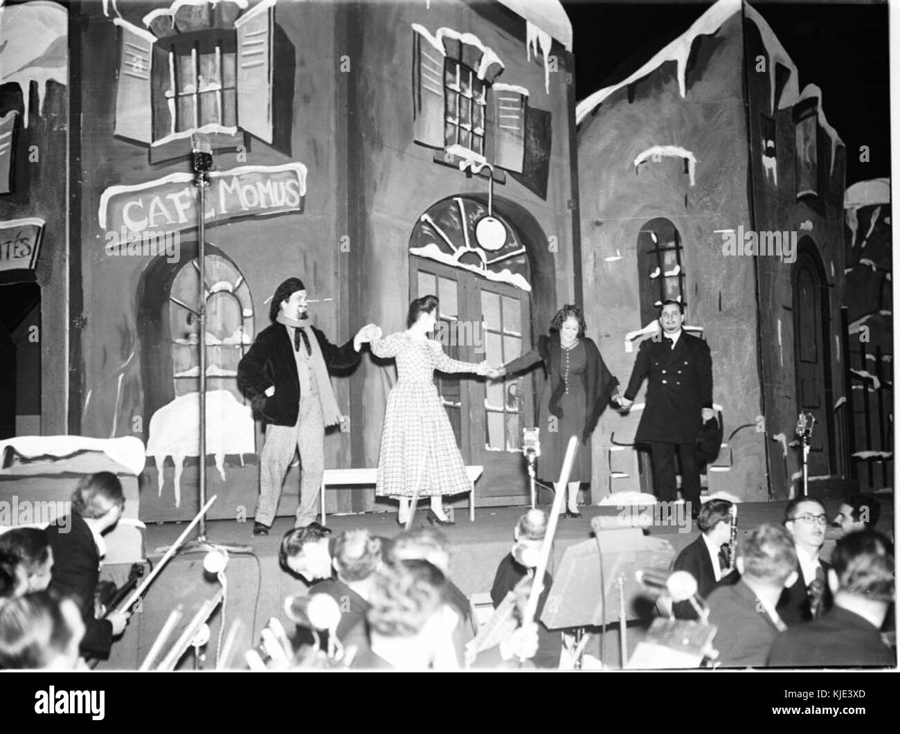 This image represents a scene from the opera 'La Bohème,' a classic ...
