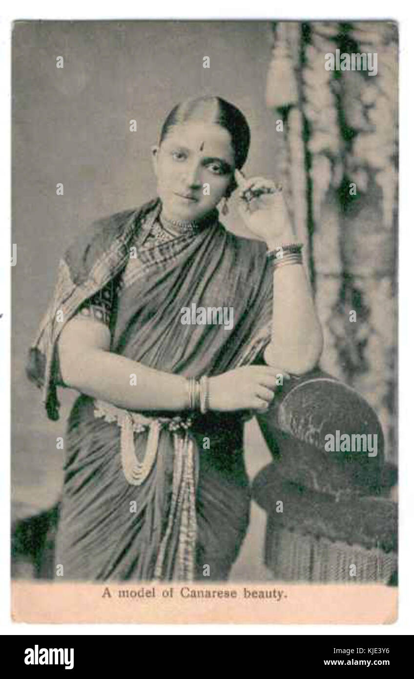 Vintage postcard of a Canarese woman Stock Photo - Alamy