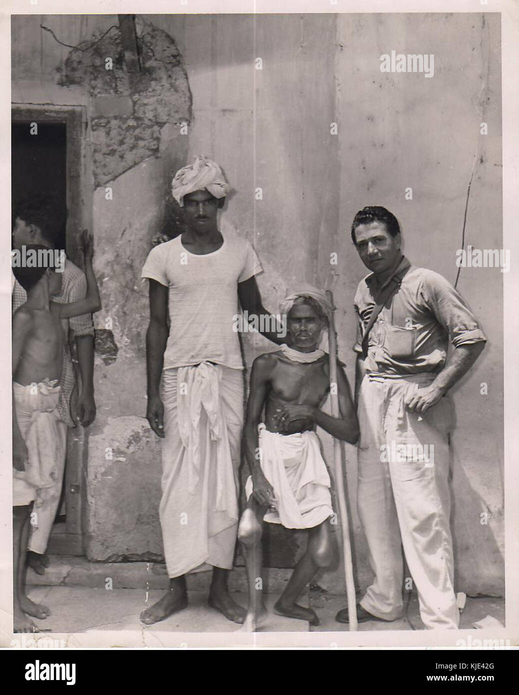 White man with Indian men Stock Photo - Alamy