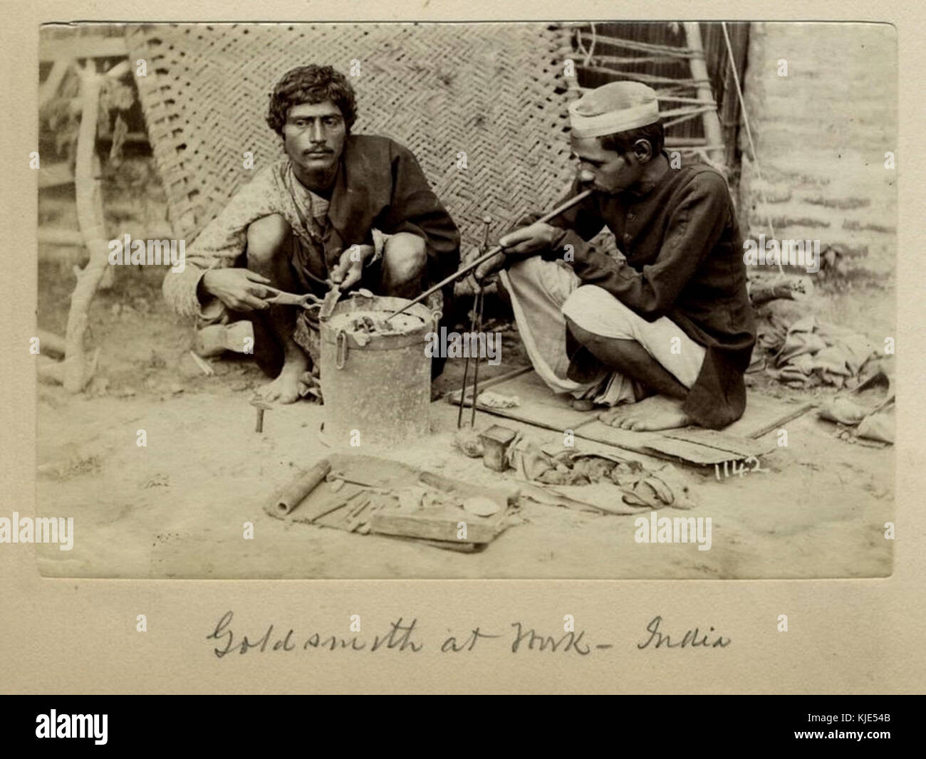 This image depicts goldsmiths working in India during the 1880s ...
