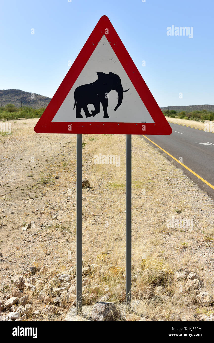 Caution: Elephants! Road sign standing beside road, Namibia, Africa ...