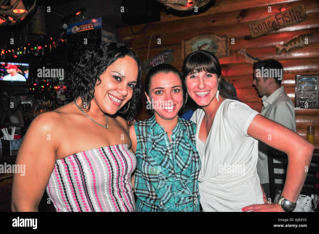 New York, New York - July 31, 2009: People having fun at a bar in New ...