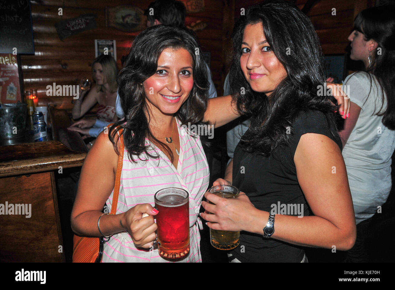New York, New York - July 31, 2009: People having fun at a bar in New ...