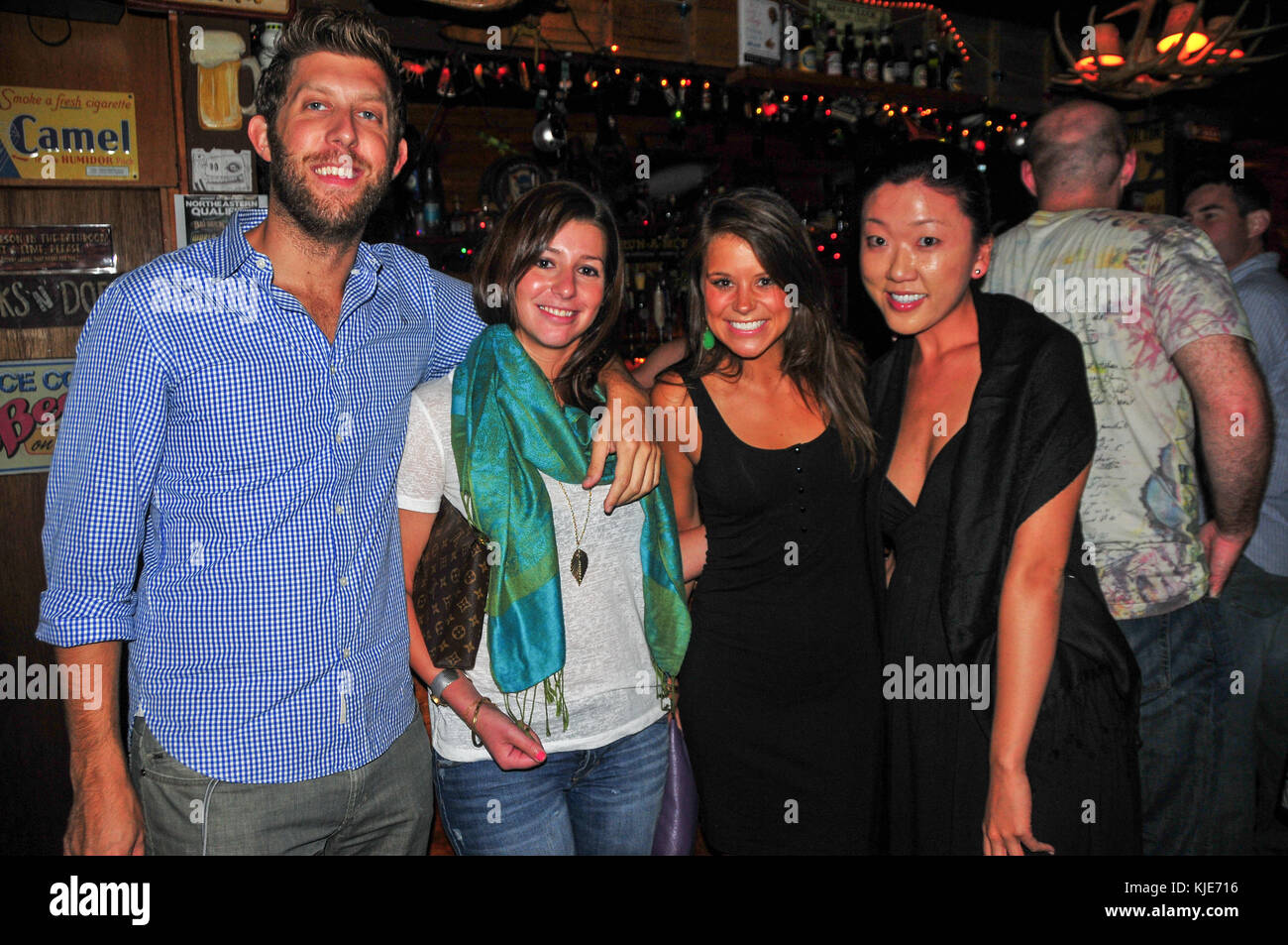 New York, New York - July 31, 2009: People having fun at a bar in New ...