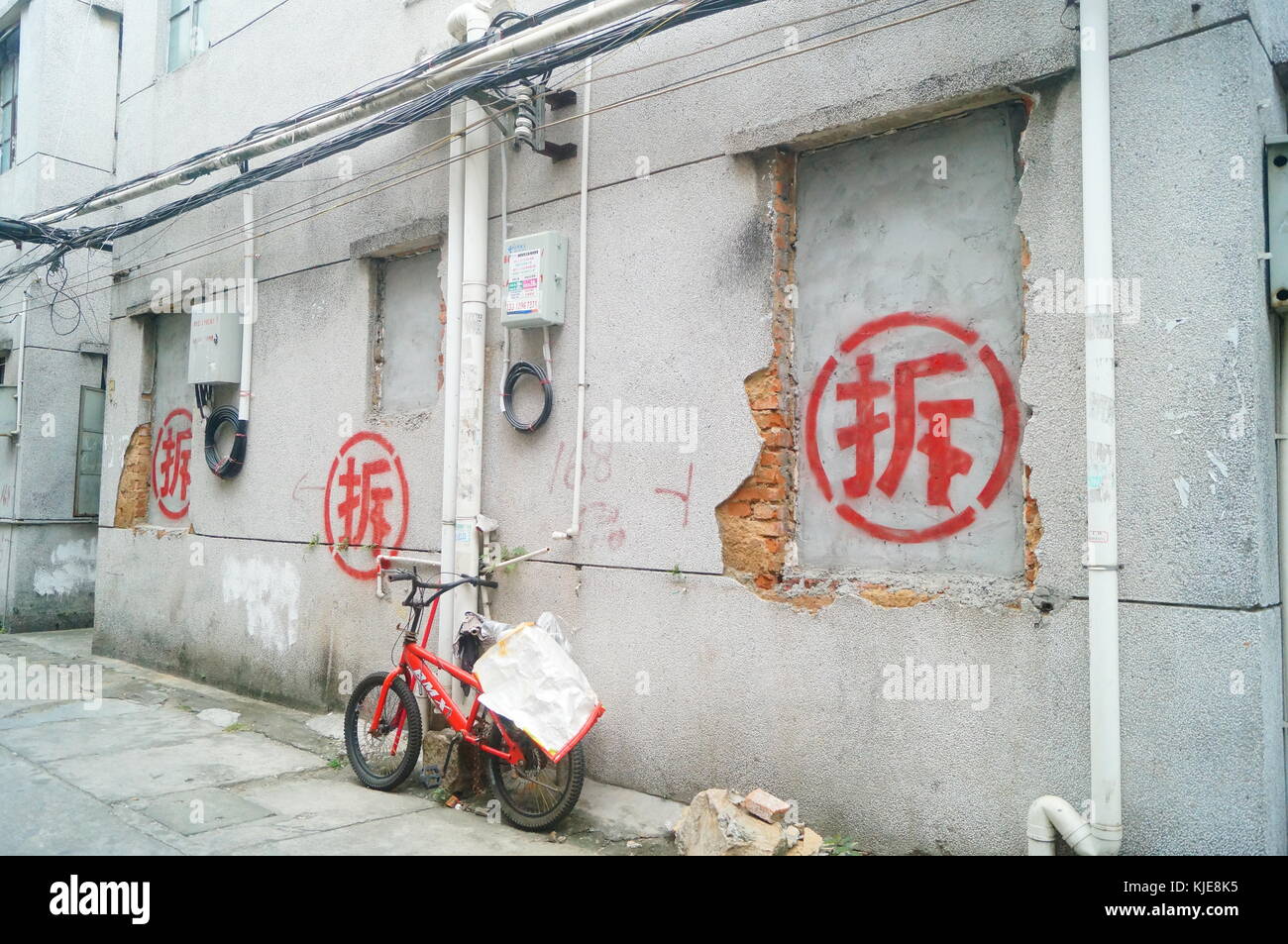 Shenzhen, China: demolition on the walls of an old residential building ...