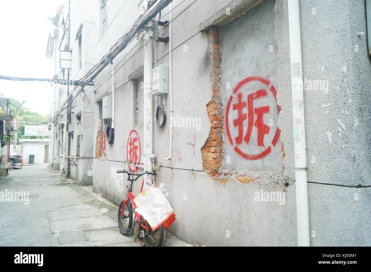 Shenzhen, China: demolition on the walls of an old residential building ...